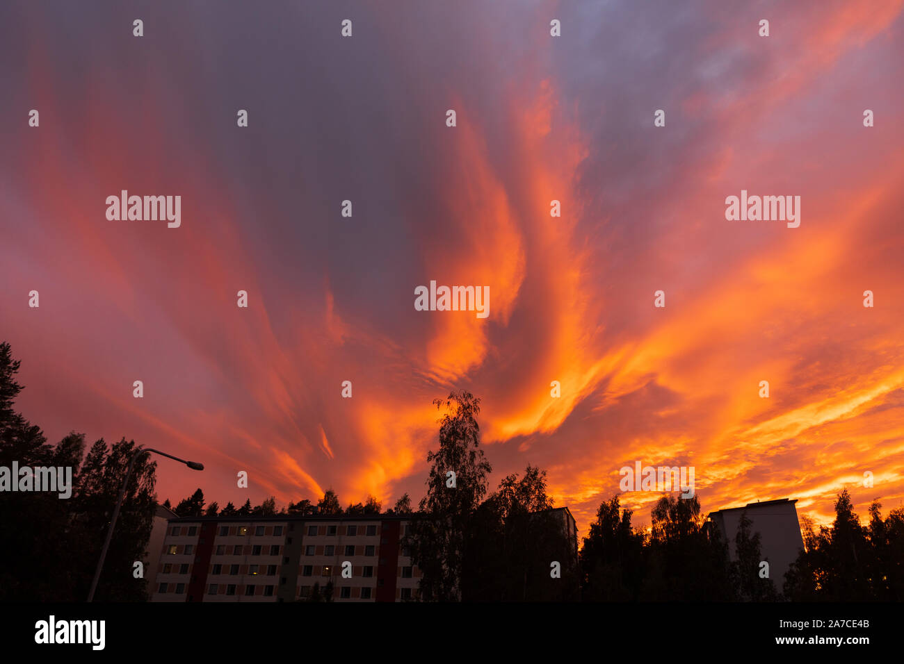 Dramatic vibrant fiery sky sunset cloudscape at dusk Stock Photo - Alamy