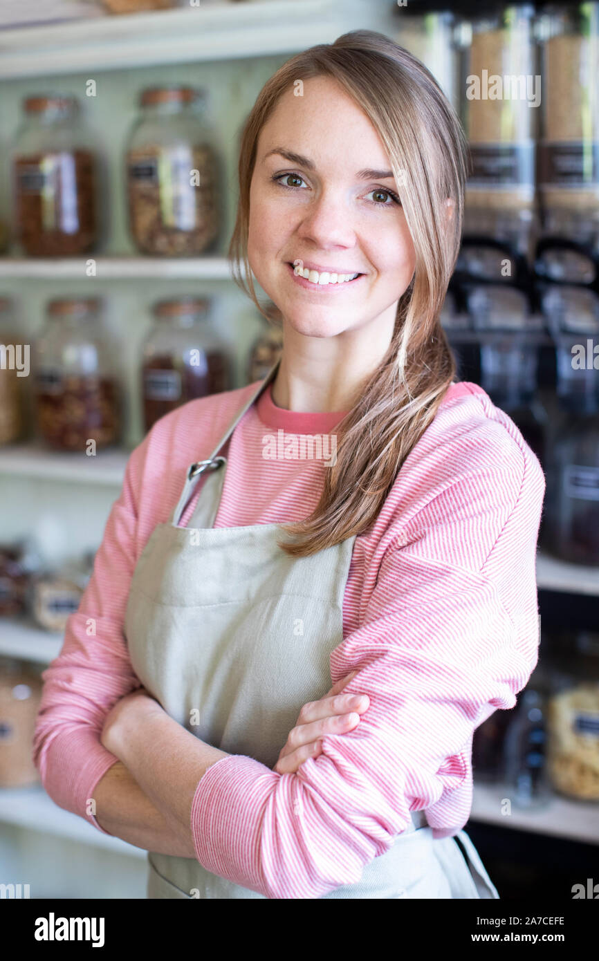 Portrait Of Female Owner Of Sustainable Plastic Free Grocery Store ...