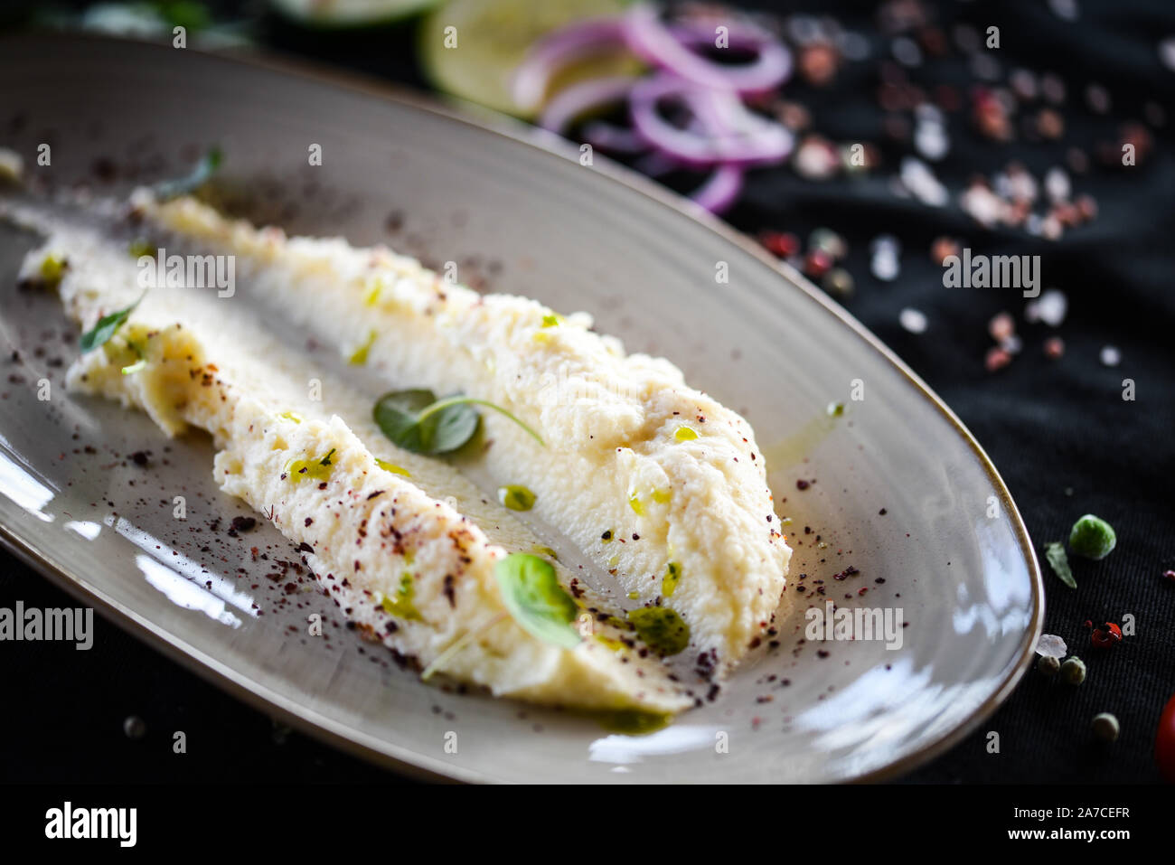delicious celery puree as garnish dish Stock Photo - Alamy