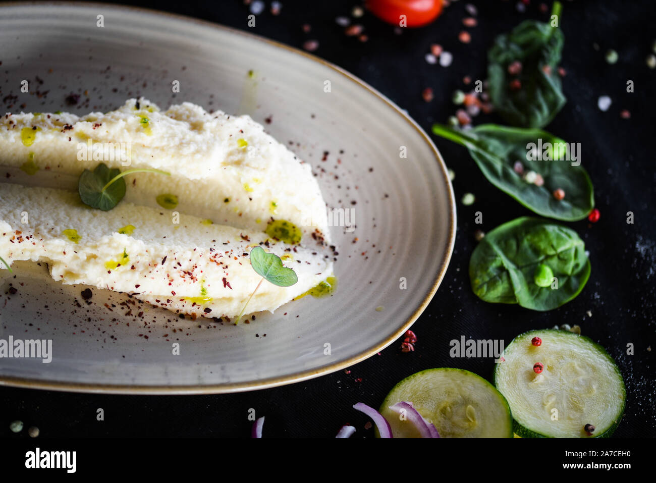 delicious celery puree as garnish dish Stock Photo - Alamy