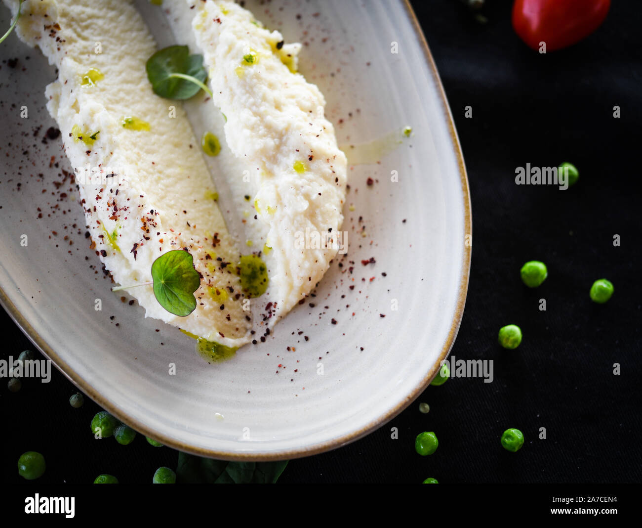 delicious celery puree as garnish dish Stock Photo - Alamy