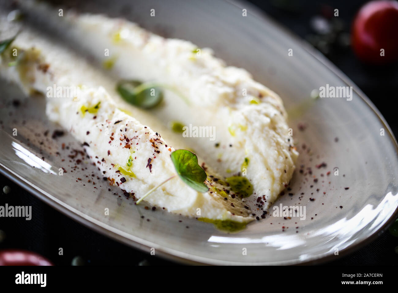 delicious celery puree as garnish dish Stock Photo - Alamy