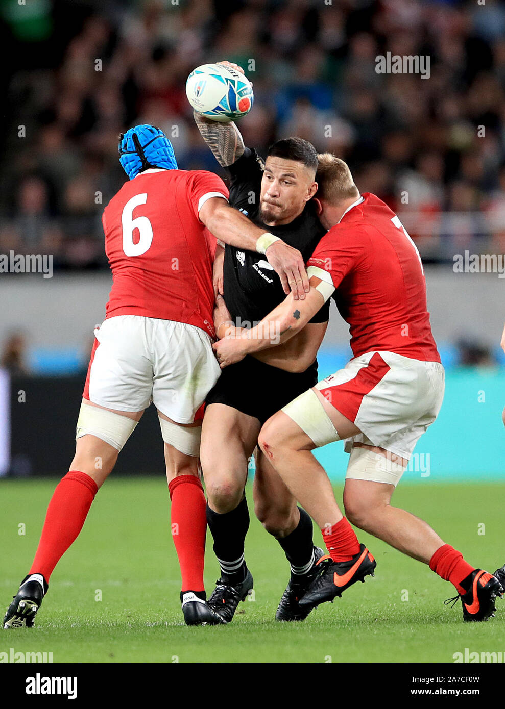 New Zealands Sonny Bill Williams Centre Is Tackled By Wales Justin