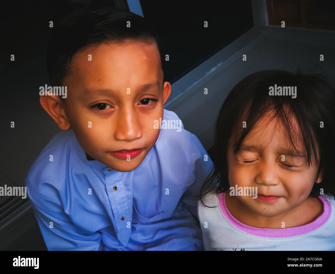 Portrait of asian brother and toddler sister. Family love bonding ...