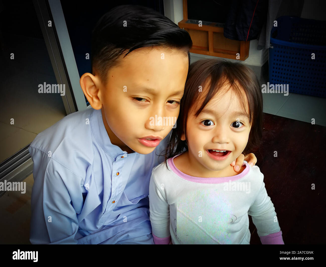 Portrait of asian brother and toddler sister. Family love bonding ...