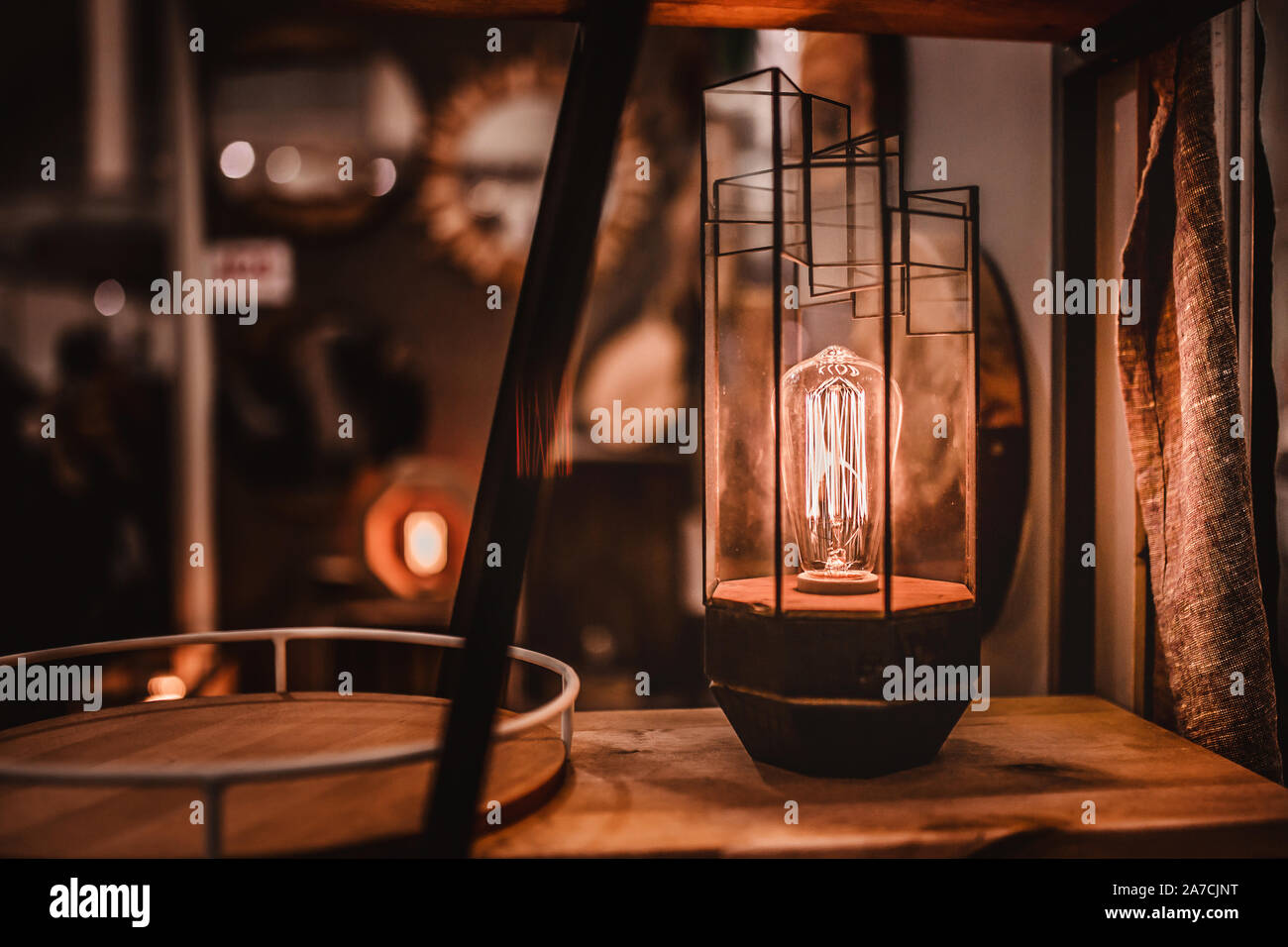 Cozy atmosphere - a warm, vintage lamp with dim light Stock Photo - Alamy