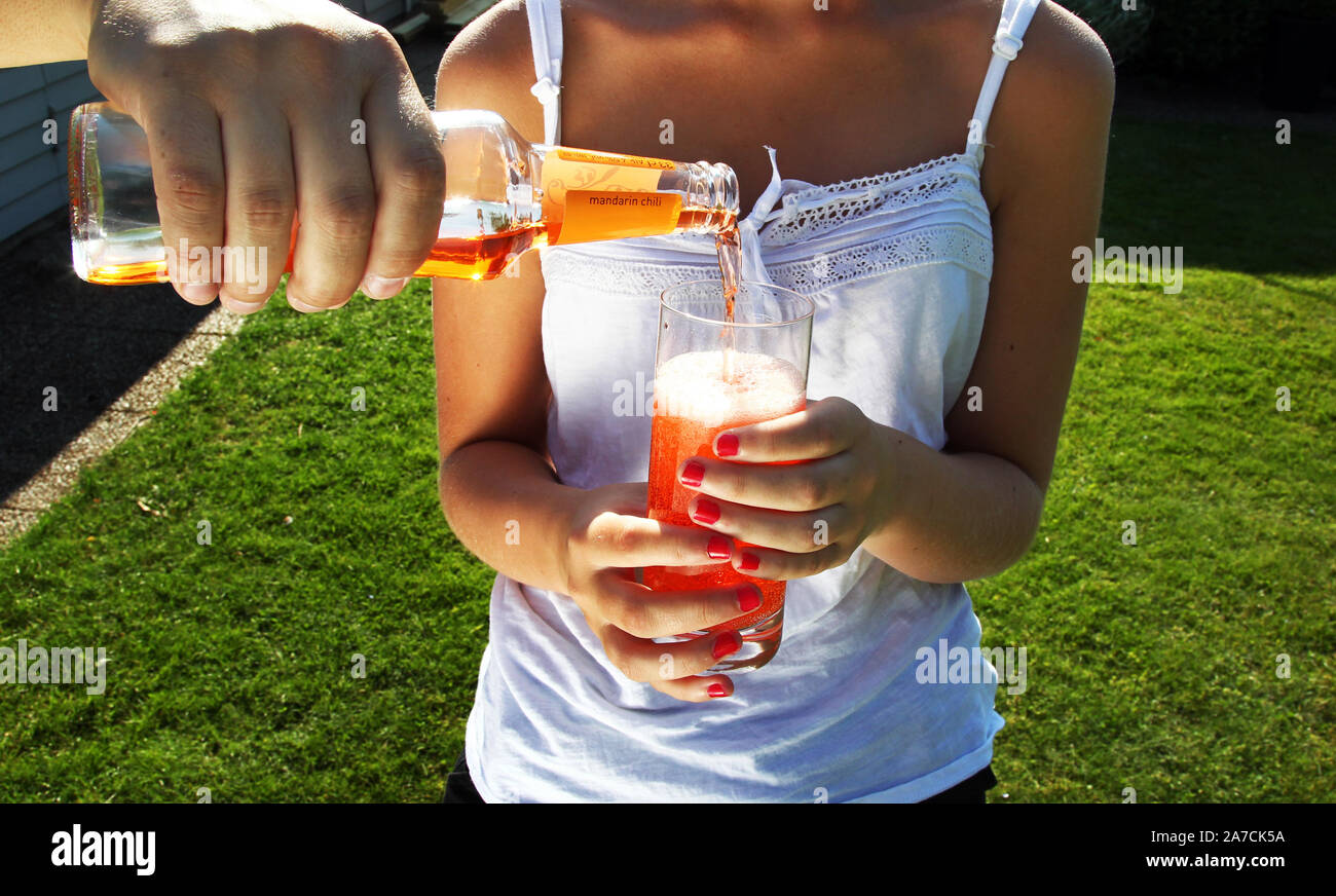 Arranged image of young girl drinking alcohol. Photo Jeppe Gustafsson ...