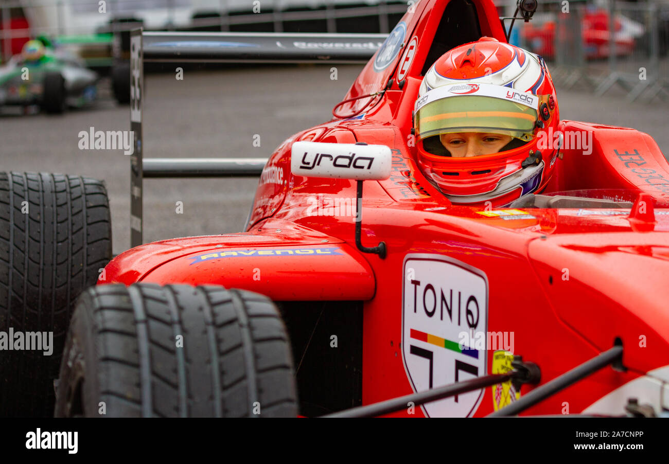 Tommy Foster in car in the paddock before the first race of the weekend ...