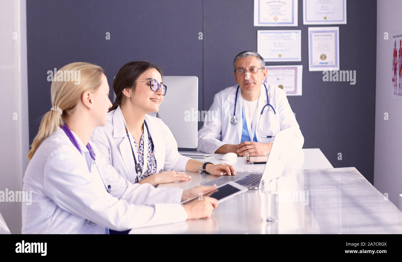 Doctors having a medical discussion in a meeting room Stock Photo - Alamy