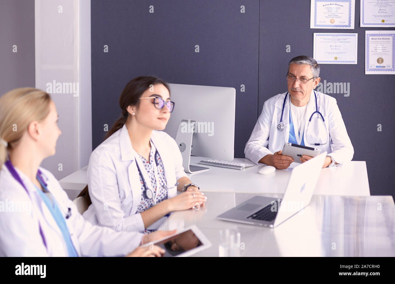 Doctors having a medical discussion in a meeting room Stock Photo - Alamy