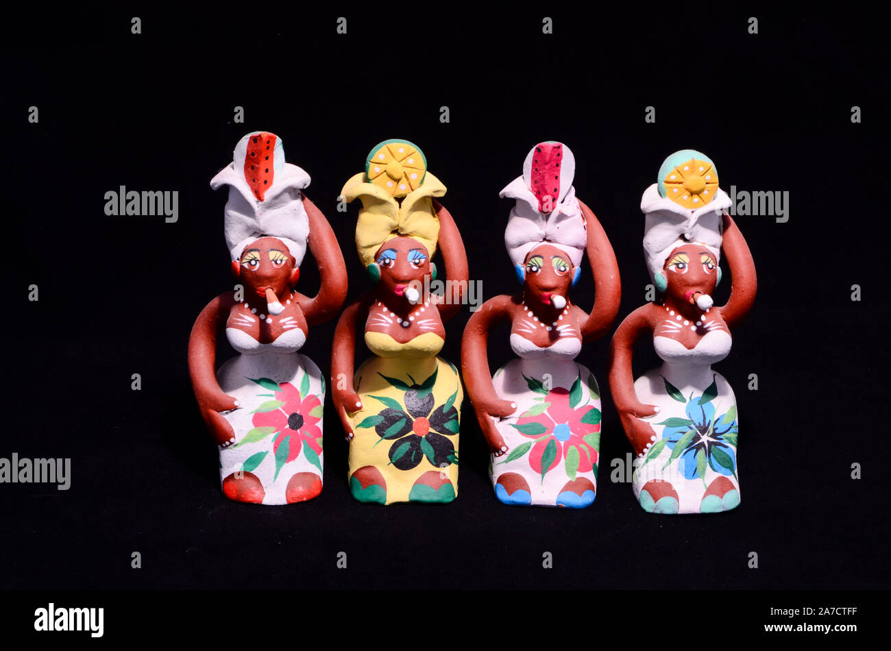 Clay Handmade Statue of a Cuban Woman on Black Background Stock Photo ...