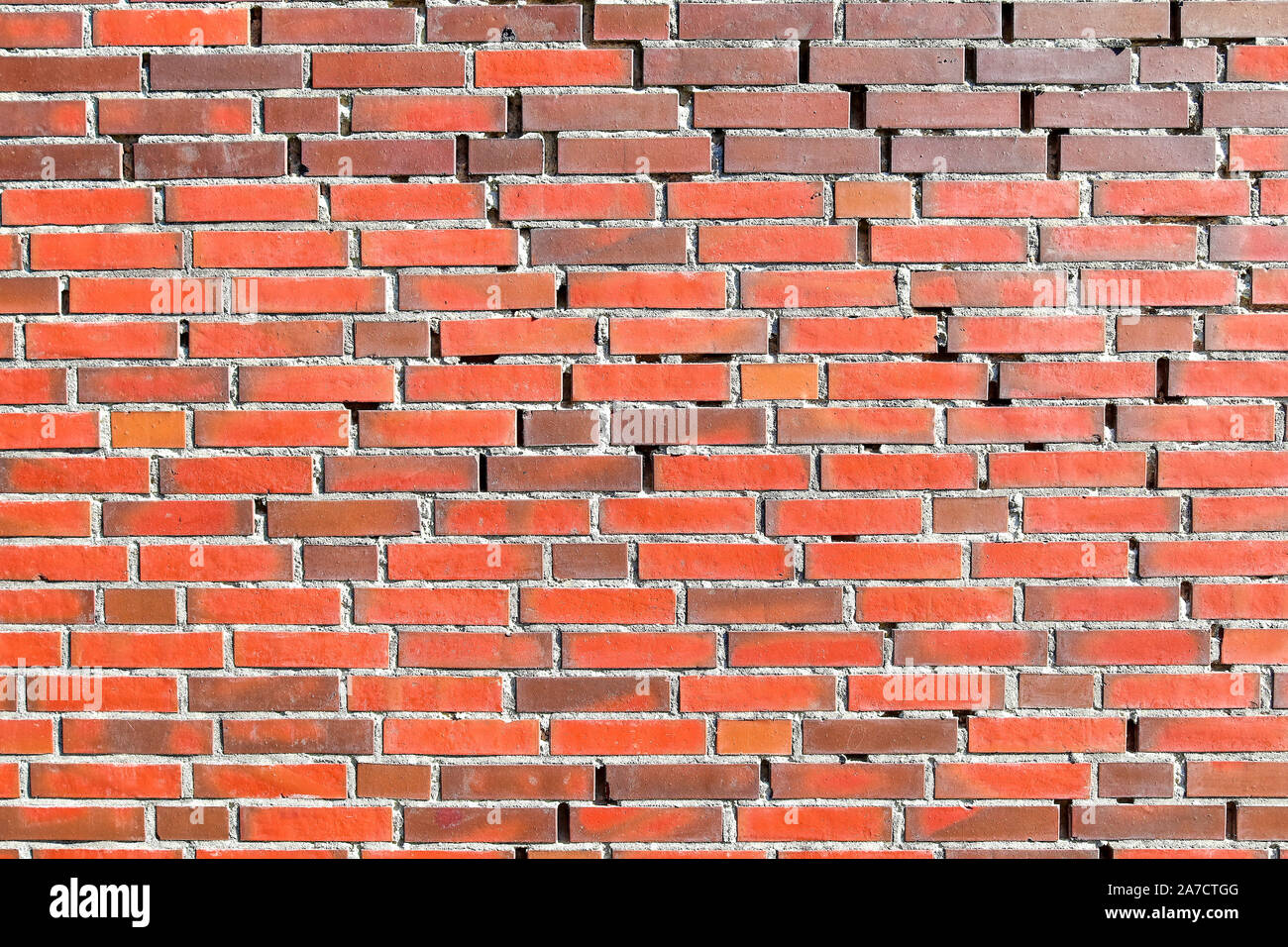 Detailed close up view on an aged and weathered red bricks wall in high ...