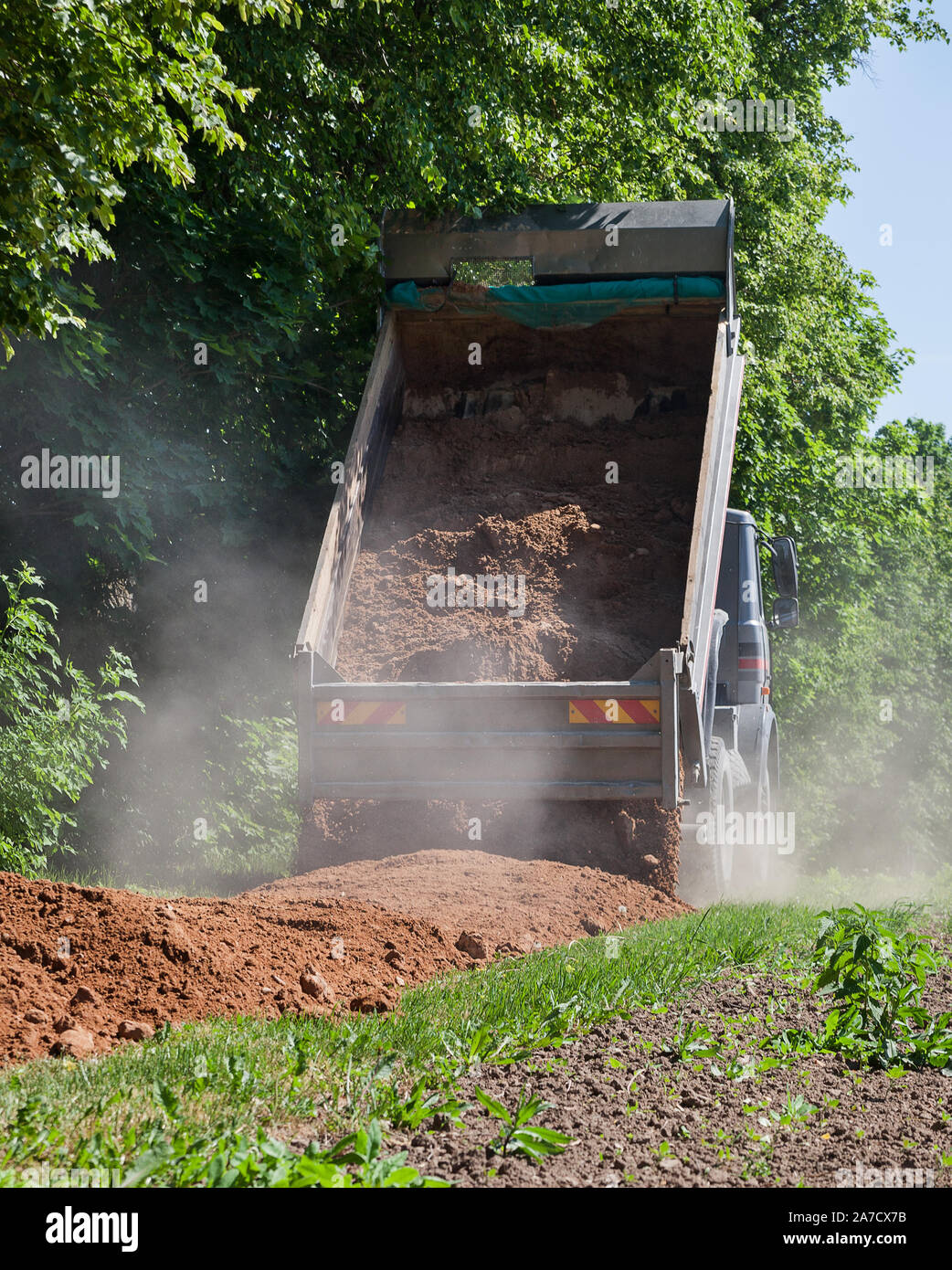 Soil road reconstruction with heavy machinery Stock Photo - Alamy