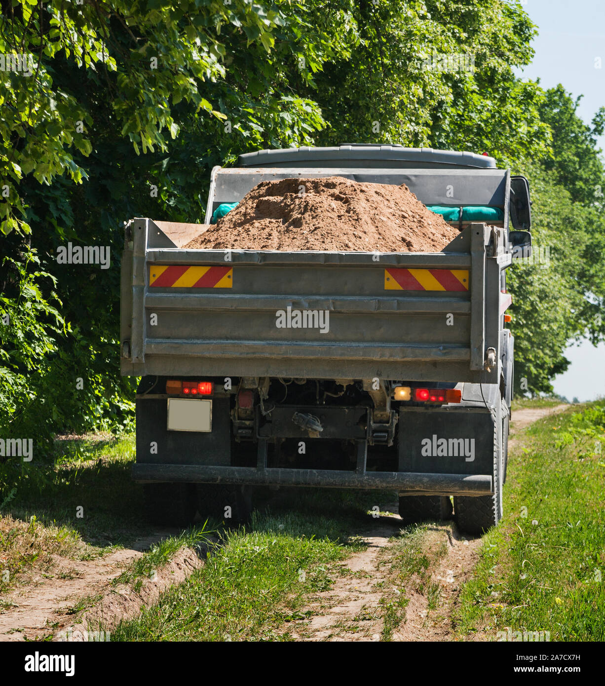 Soil road reconstruction with heavy machinery Stock Photo - Alamy