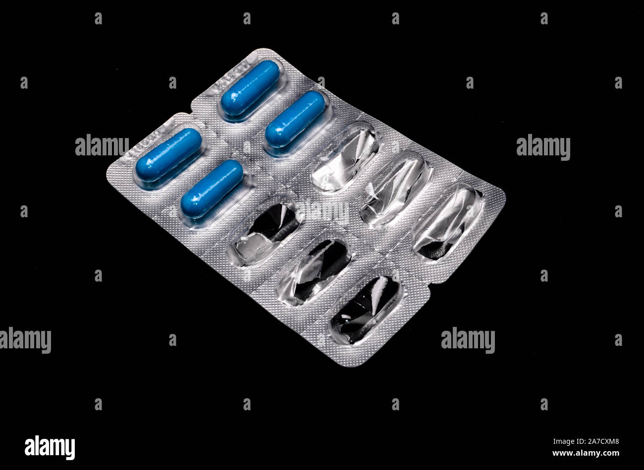 Blue Medication Capsules In Blister Pack Close-up Stock Photo - Alamy