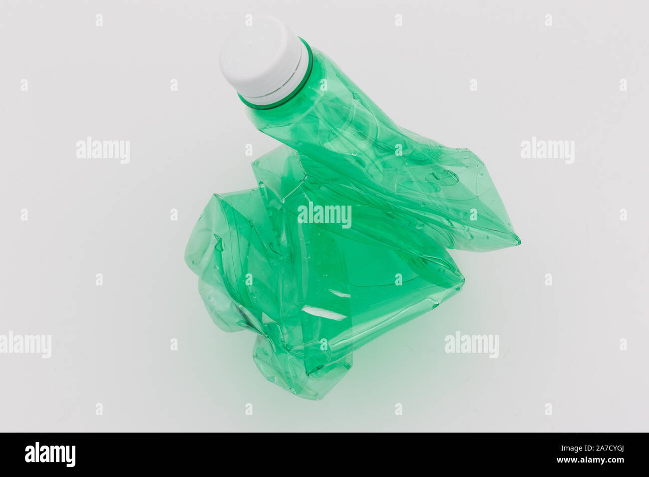 Old plastic bottle in the trash Stock Photo - Alamy