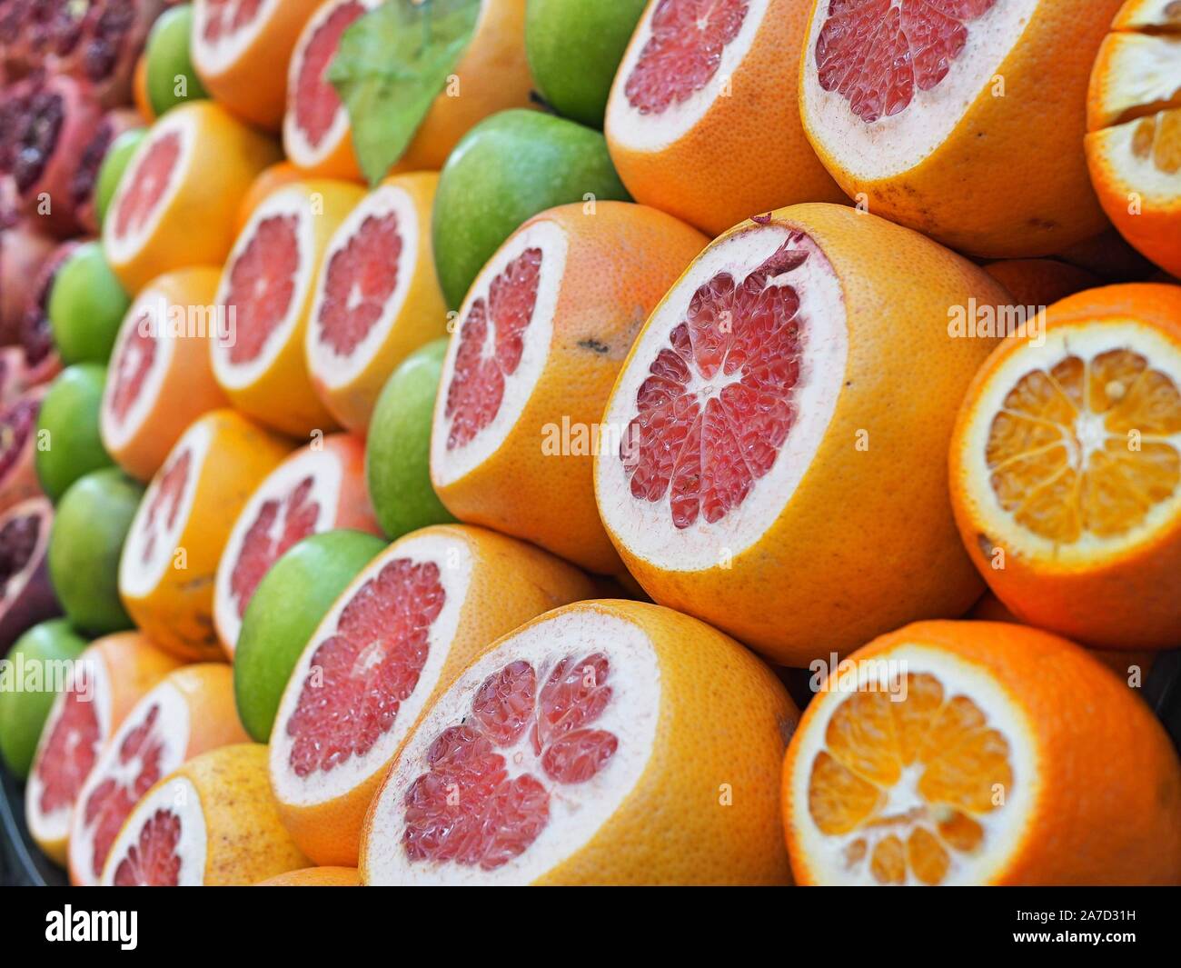 Red oranges and green apple in turkish fruit market presented for ...