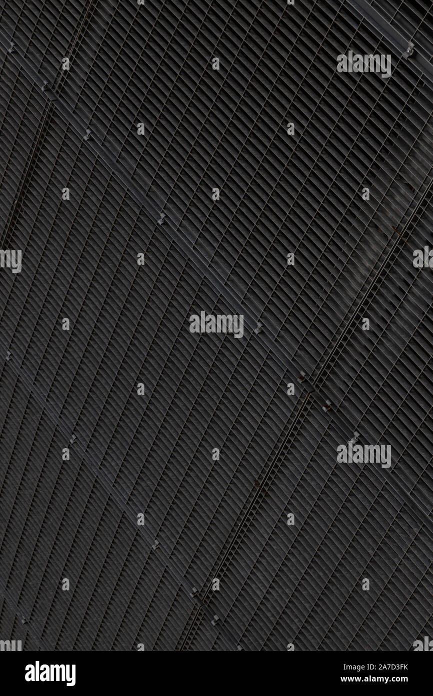 Black metal ventilation grill in ceiling inside building Stock Photo ...