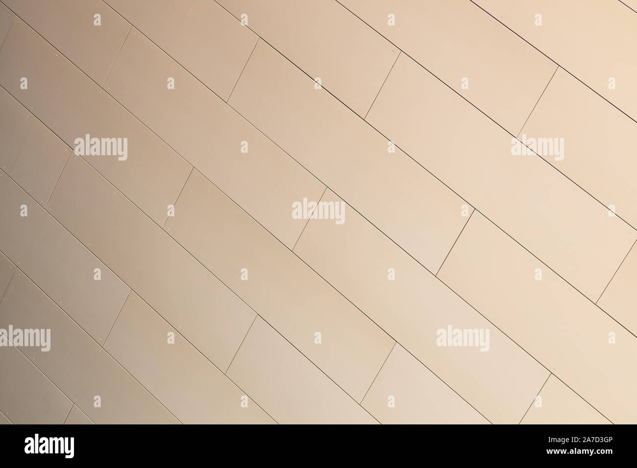 Matte beige color tiled wall of building Stock Photo - Alamy