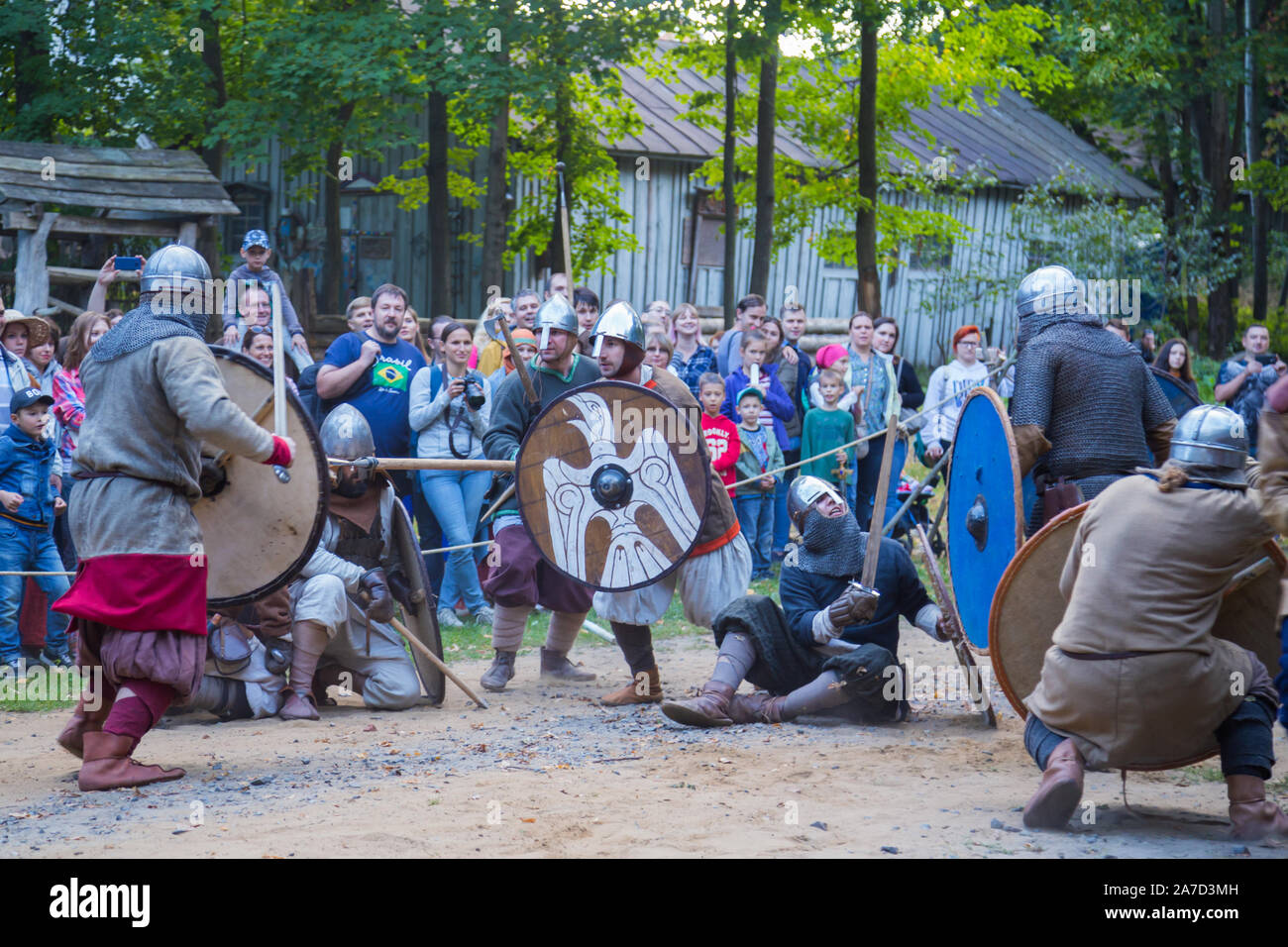 Militant medieval warriors fighting at historical festival Stock Photo ...