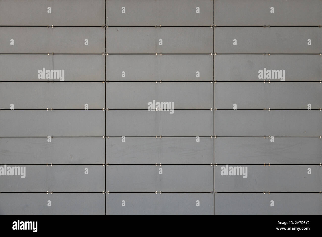 Front view of light grey surface made of small metal tiles Stock Photo ...