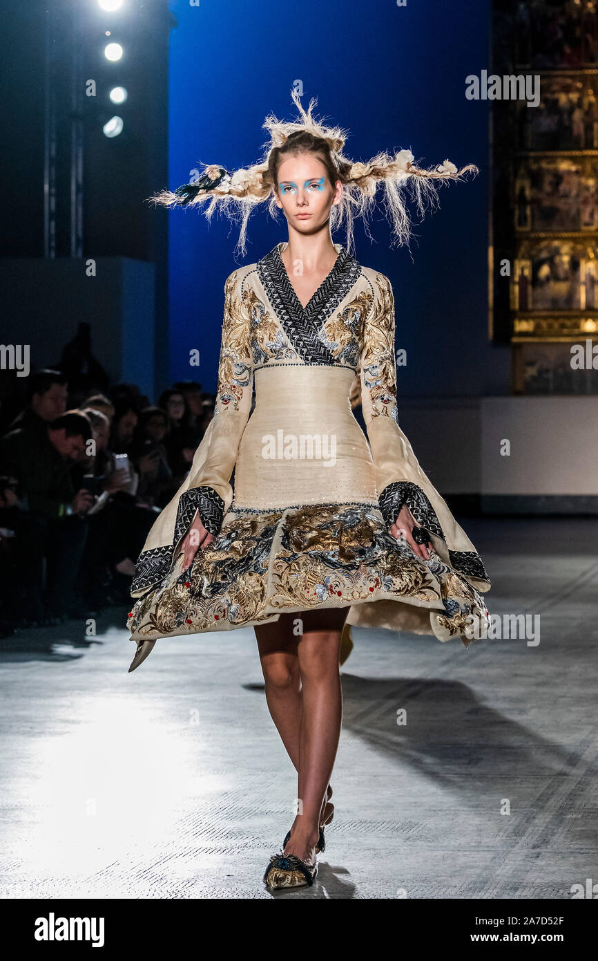 London, UK. 1st Nov 2019. Guo Pei’s first ever runway show in the UK ...