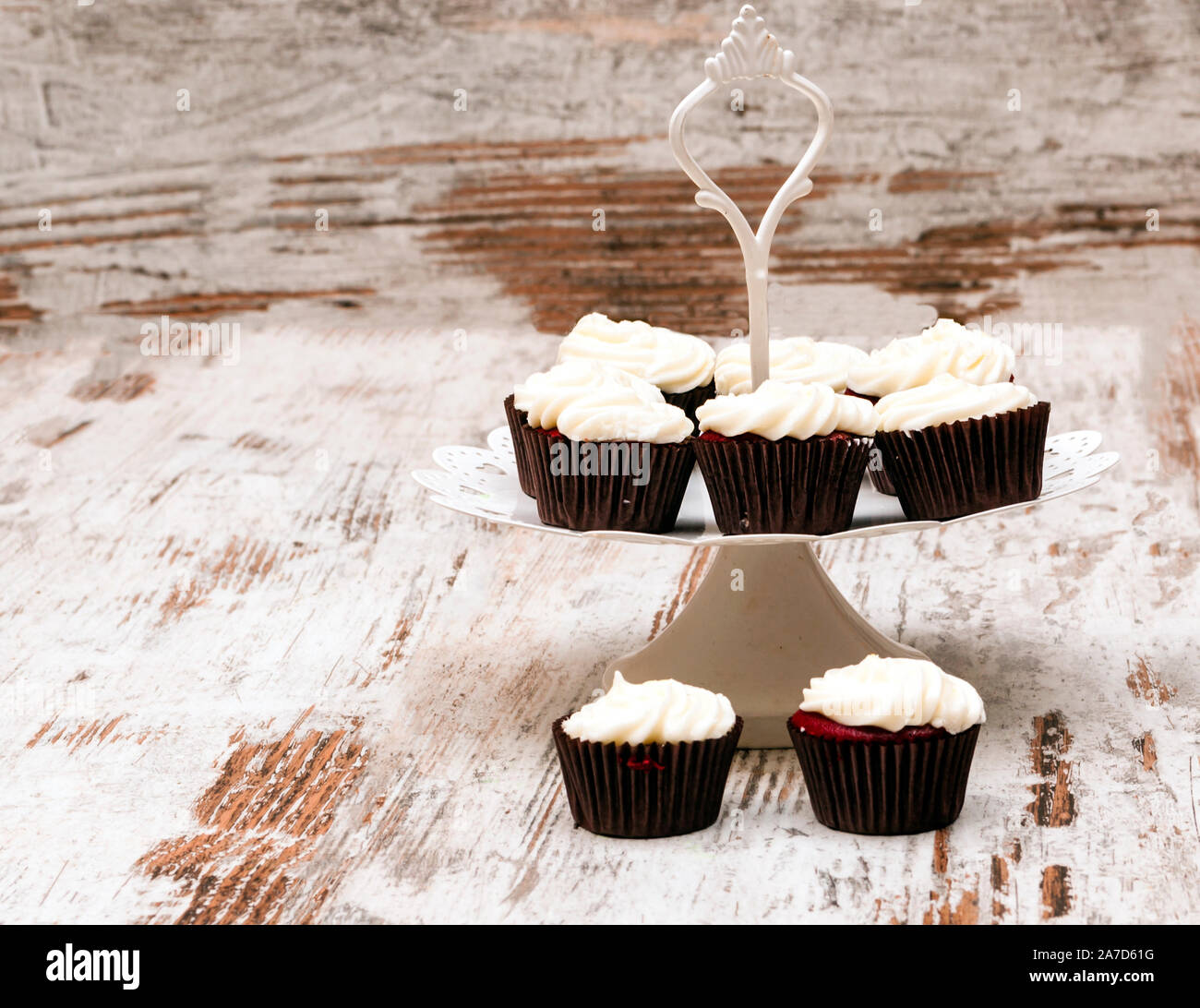 Cupcakes surrounded by rustic background Stock Photo - Alamy