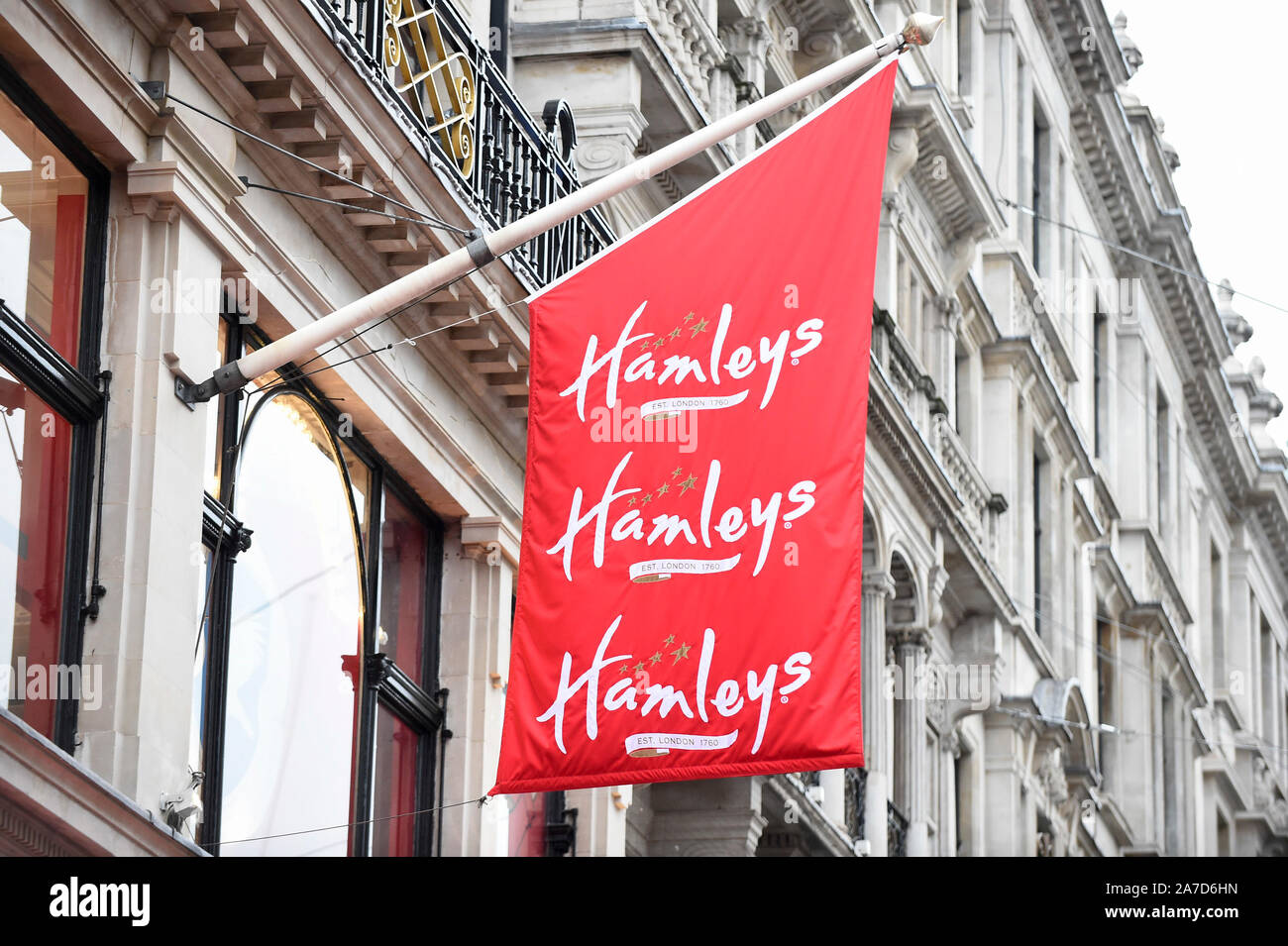 London, UK. 1 November 2019. A flag with the Hamleys logo flies ...
