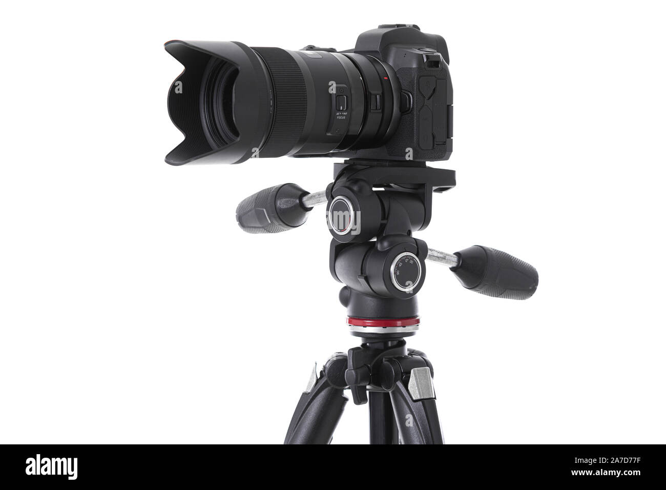 Side-view of professional camera device on tripod isolated Stock Photo ...