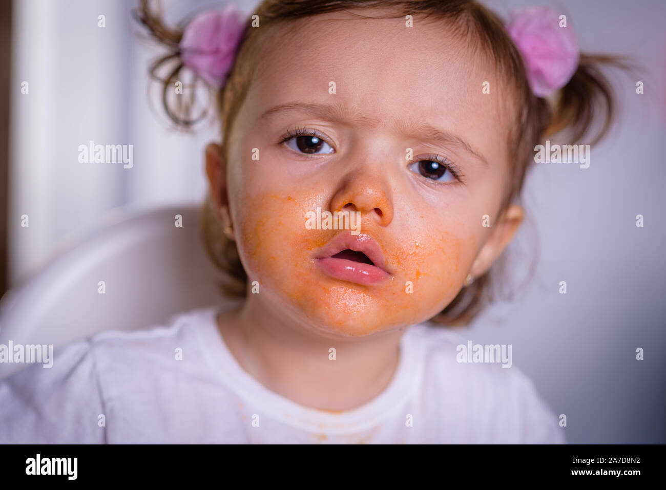 little girl with tomato spotted face Stock Photo - Alamy