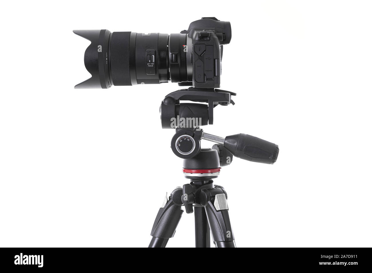 Side-view of professional camera device with big camera glass isolated ...