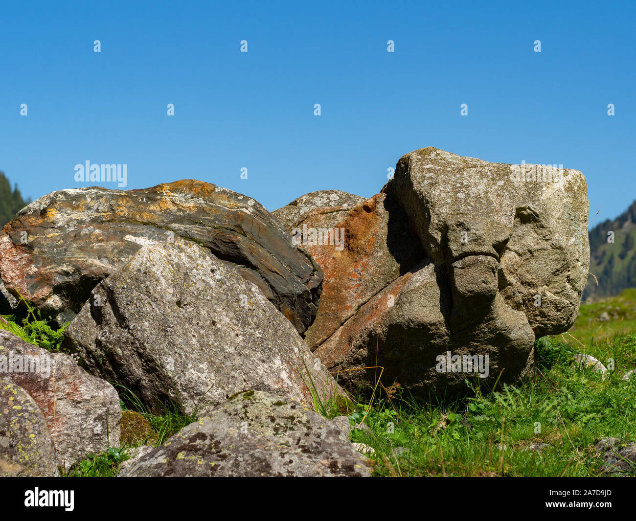 Rock formation and blue sky in alps Stock Photo - Alamy