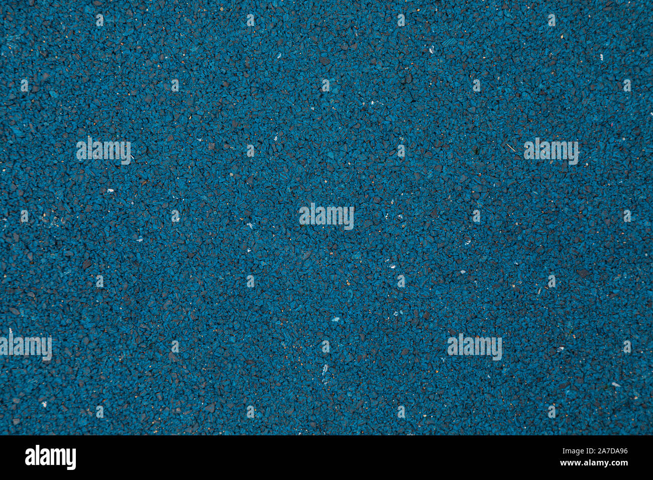 Blue painted ground covering outside in the daylight Stock Photo - Alamy
