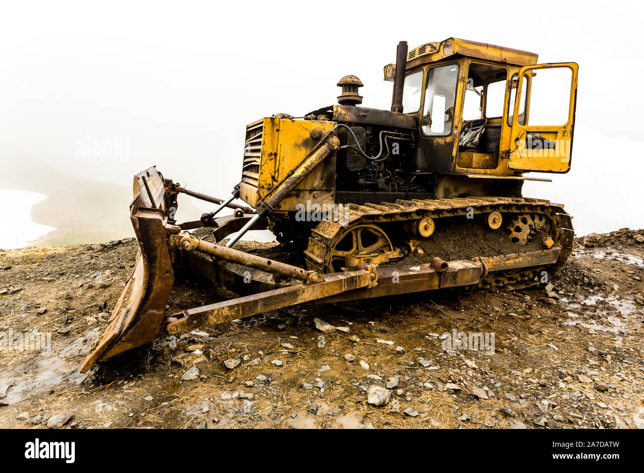 Old broken tractor on the mountain pass Abano (2926 m). Georgia ...