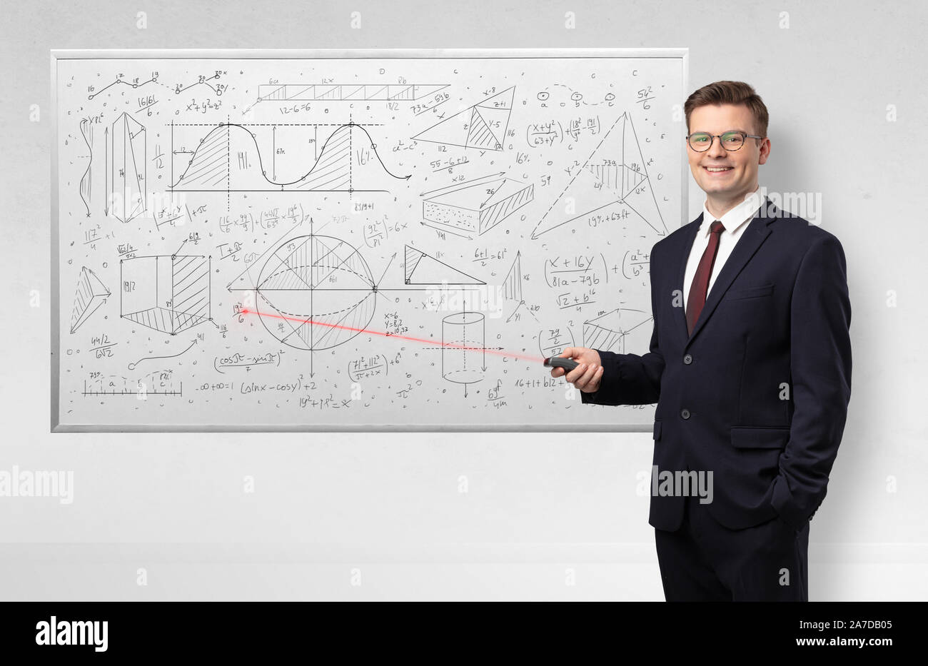 Professor with laser pointer teaching geometry Stock Photo - Alamy