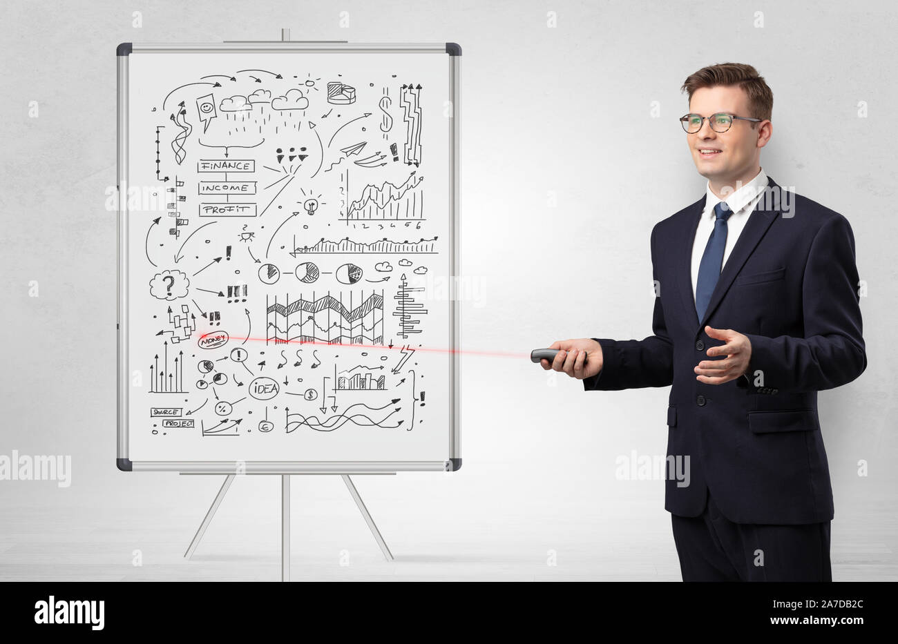 Professor with laser pointer teaching business theories Stock Photo - Alamy
