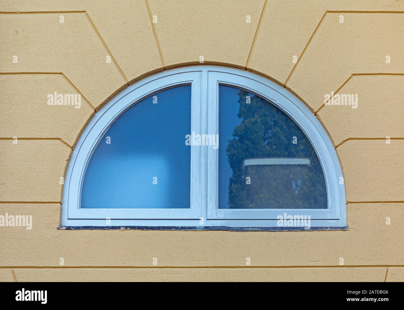 Arch Window at Yellow House Building Stock Photo - Alamy