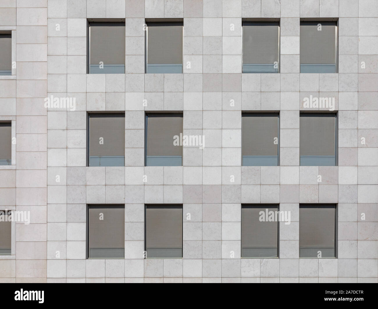 Gray Windows at Modern Marble Building Facade Stock Photo - Alamy