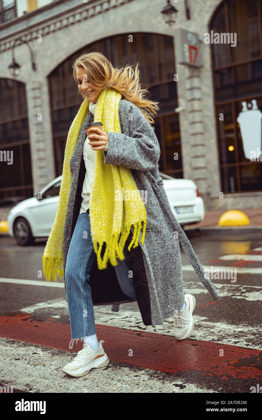 Woman looking up walking across hi-res stock photography and images - Alamy
