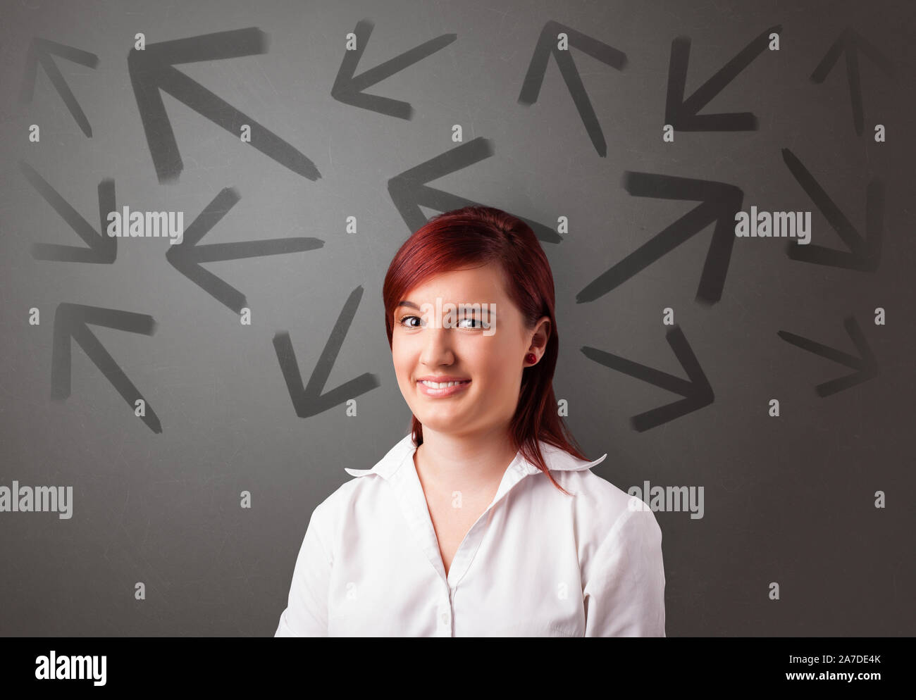 Business person choosing between two directions Stock Photo - Alamy