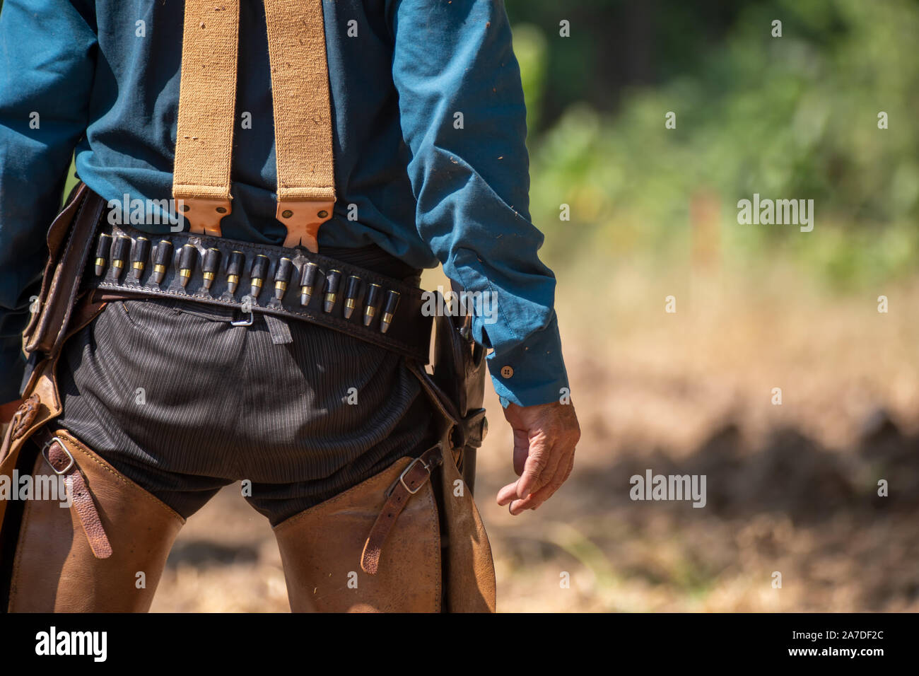 rear view of cowboy gun fight Stock Photo - Alamy