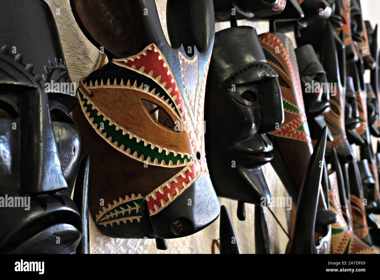 Wooden sardinian masks of "su Merdule" (the farmer) and "su Boe" (the ...