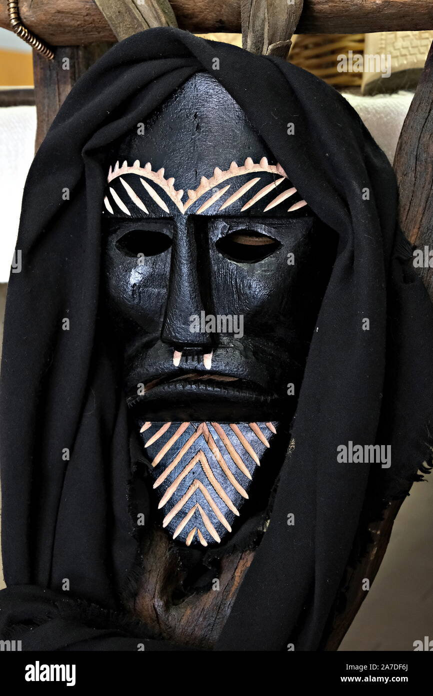 Close view of a wooden sardinian masks of "su Merdule" (the farmer ...