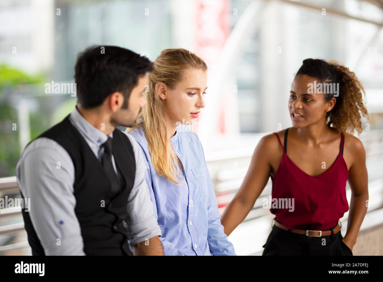 Group of business people talking at outside the office Stock Photo - Alamy