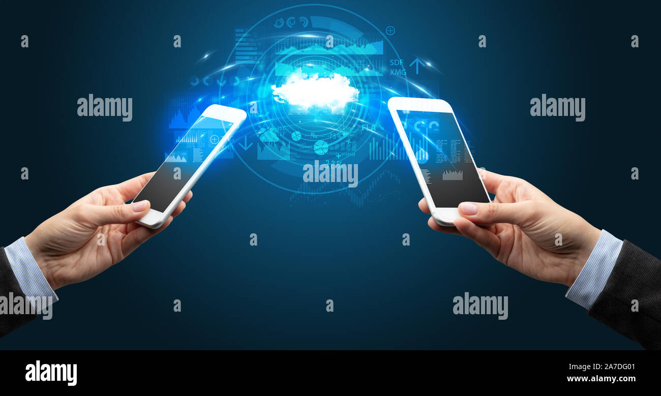 Two smart phones technology transfer hi-res stock photography and images - Alamy