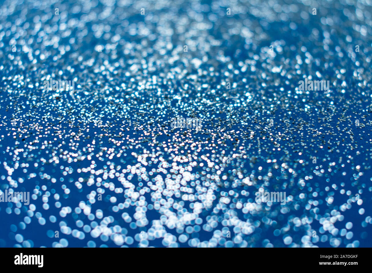 Blue shiny background of little sparkles Stock Photo - Alamy