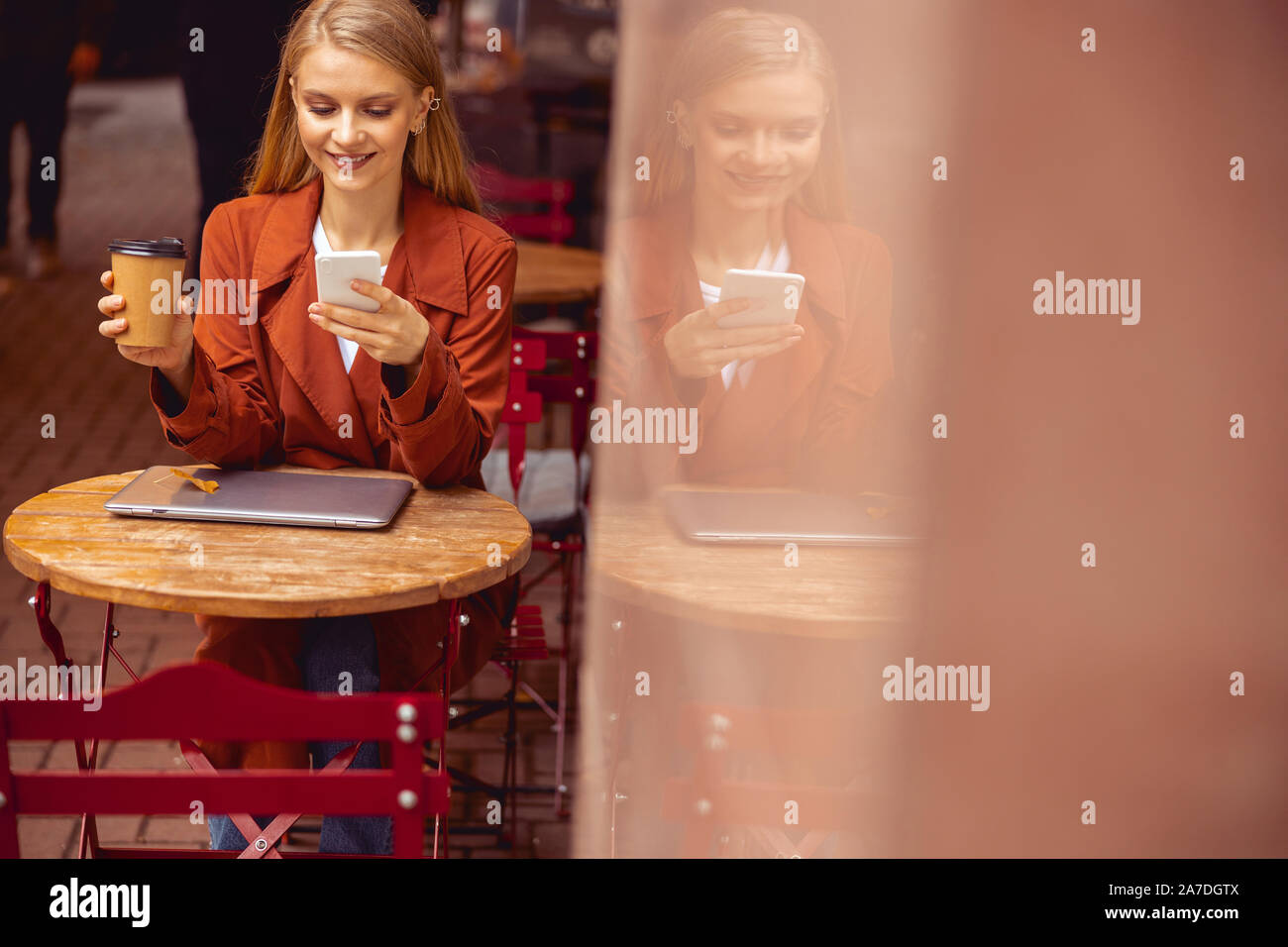 Cute girl sending text message hi-res stock photography and images - Alamy