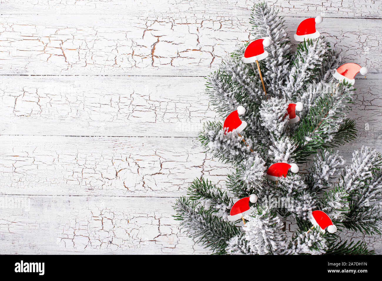 Christmas background with decorative Santa hats Stock Photo - Alamy