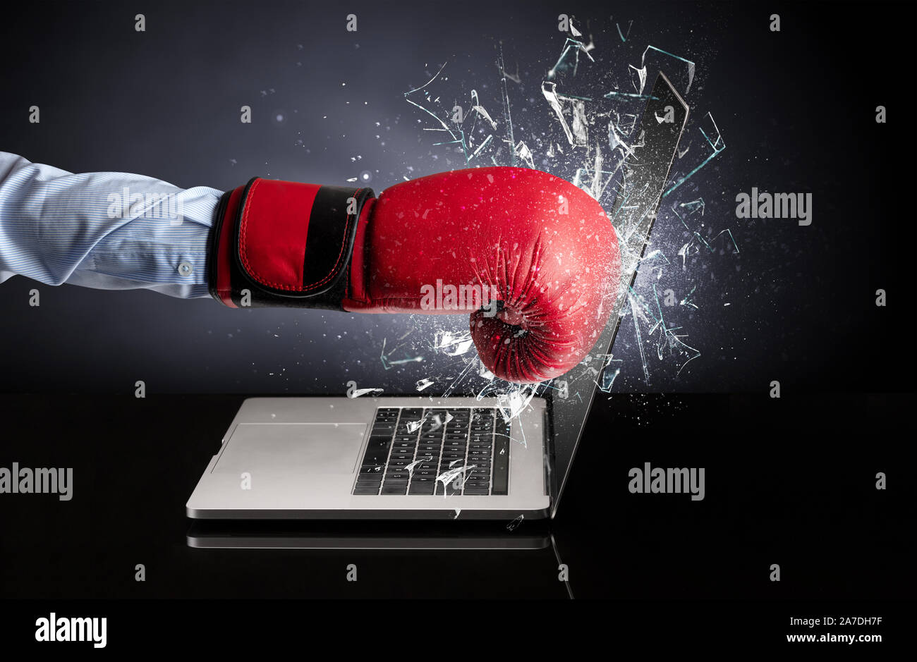 Hand hitting strongly laptop screen glass Stock Photo - Alamy