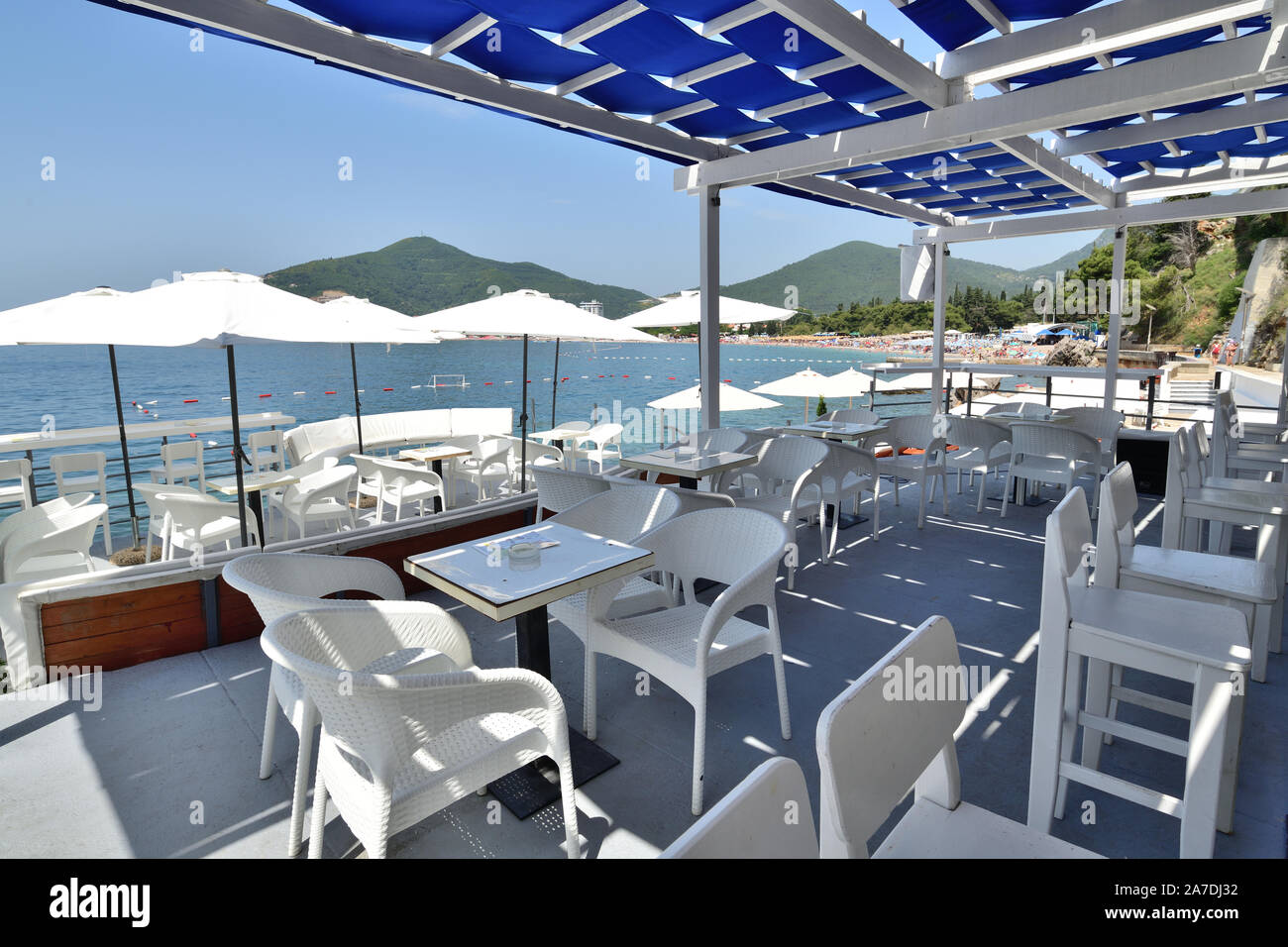 Outdoor cafe by the sea in Budva, Montenegro Stock Photo - Alamy